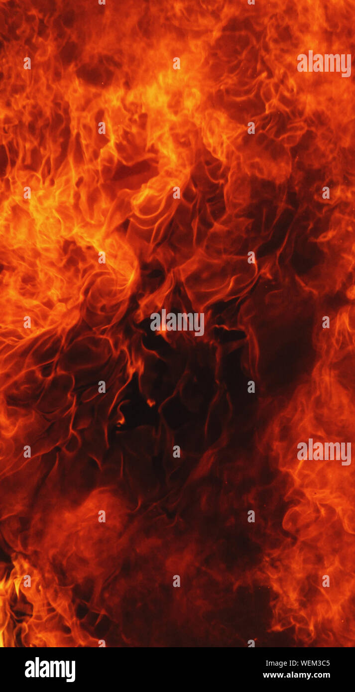 background of fire as a symbol of hell and eternal torment Stock Photo ...