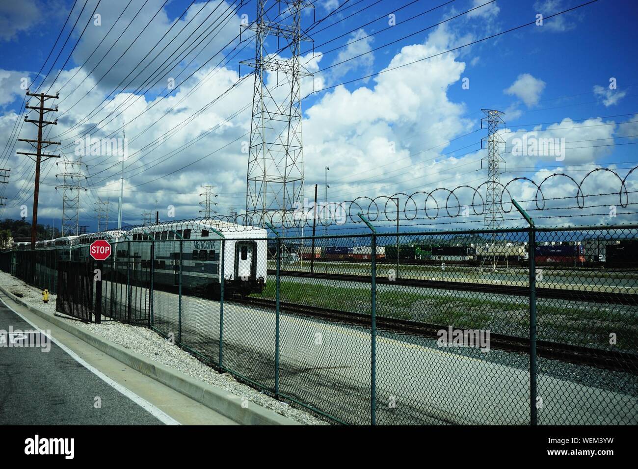 Train Behind Fence High Resolution Stock Photography and Images - Alamy