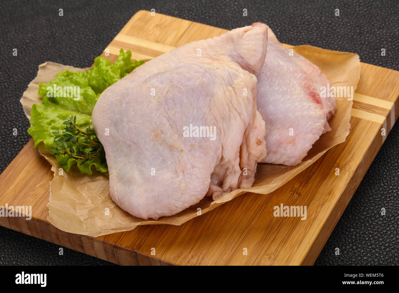 Raw chicken hip ready for cooking Stock Photo - Alamy