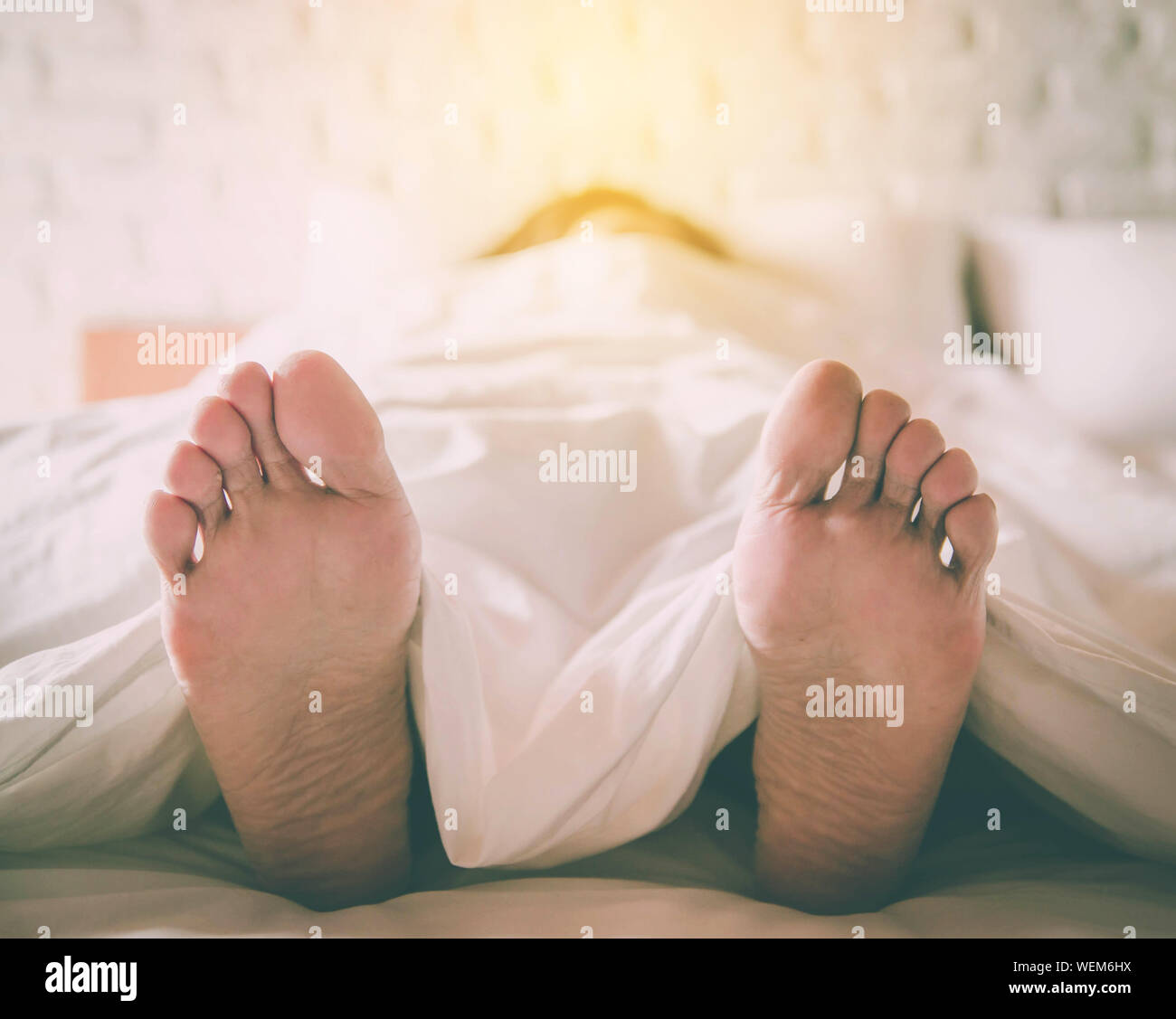 Person sleeping in bed hi-res stock photography and images - Alamy