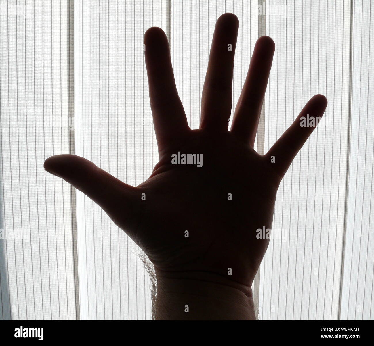 Hand against window hi-res stock photography and images - Alamy