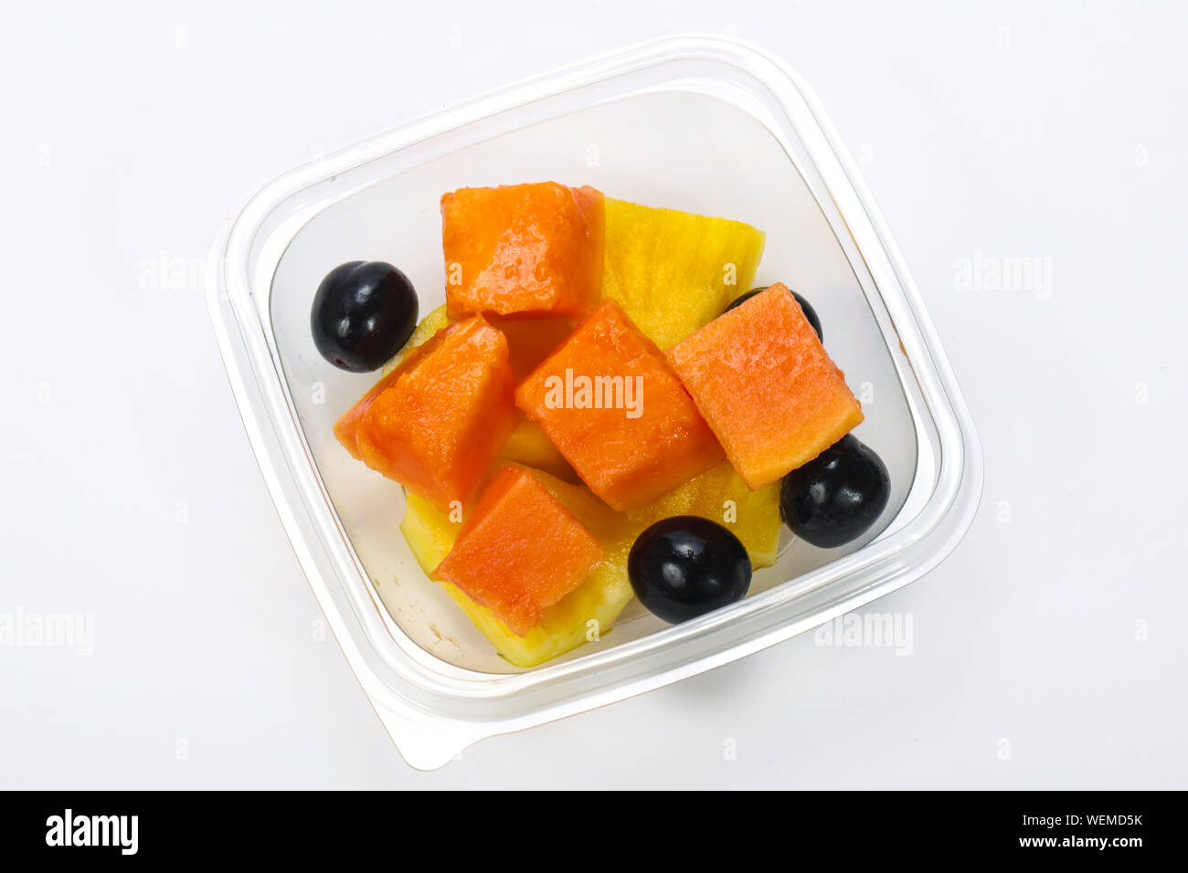 Sliced tropical fruit mix snack in the box Stock Photo - Alamy