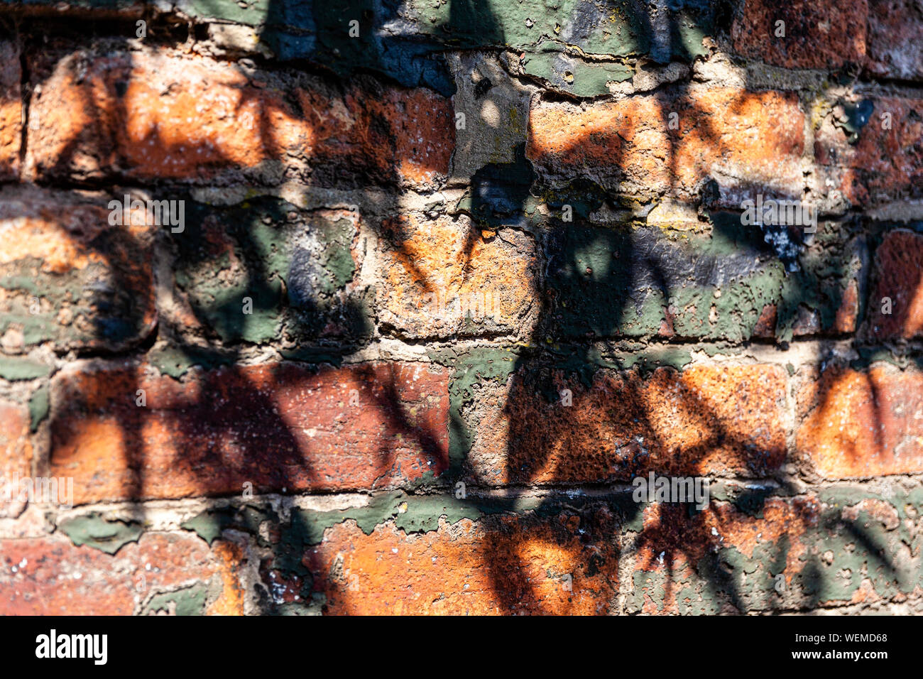 Shadows shadow brick wall hi-res stock photography and images - Alamy