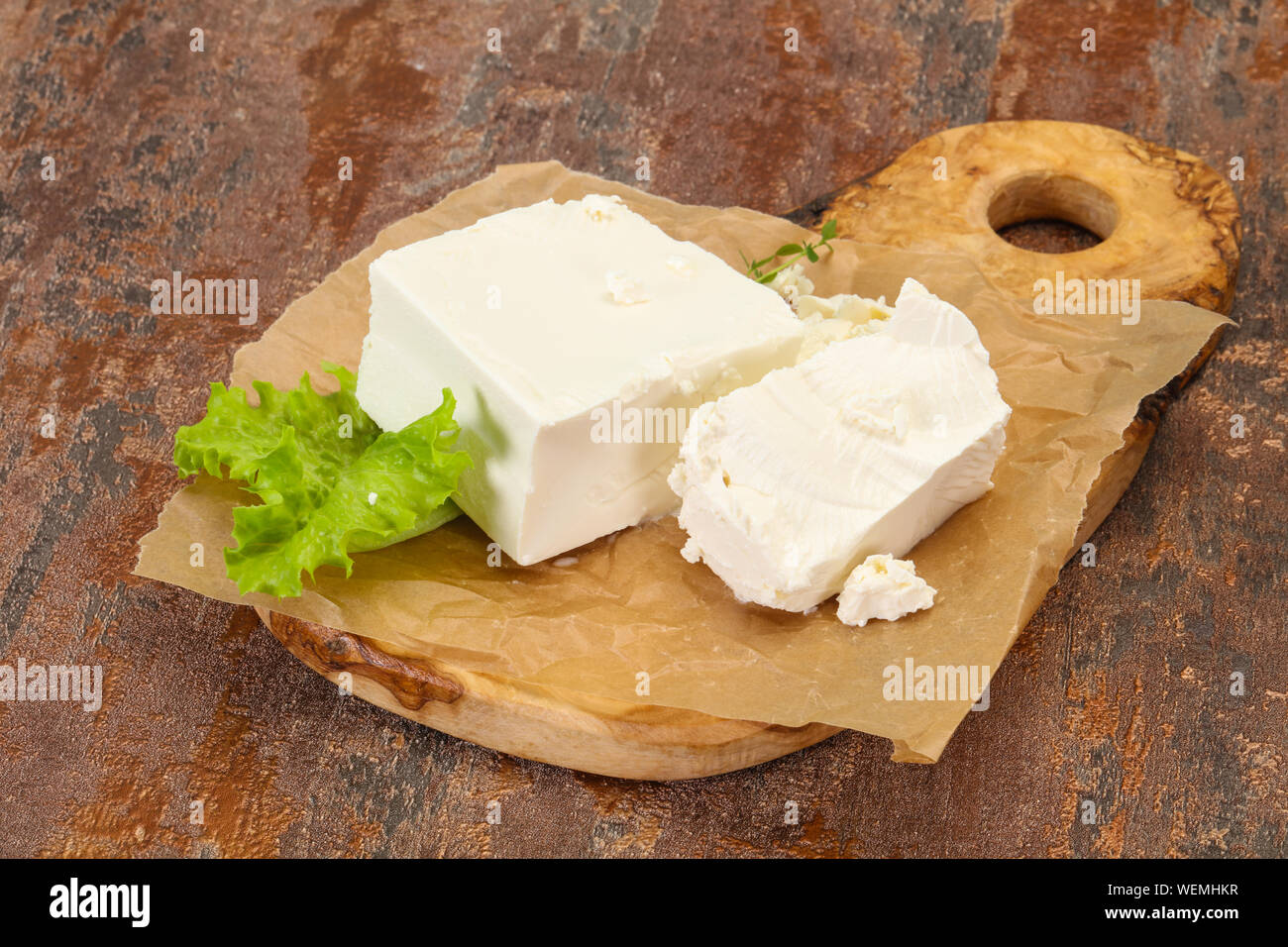 Greek traditional Feta soft cheese in the plate Stock Photo - Alamy