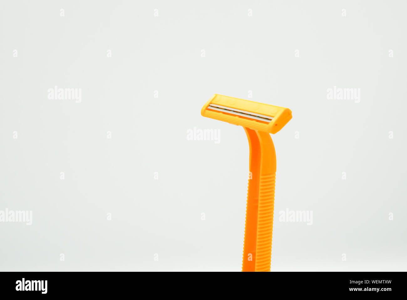 Shaving razor blades for men or women in yellow color, the object is ...