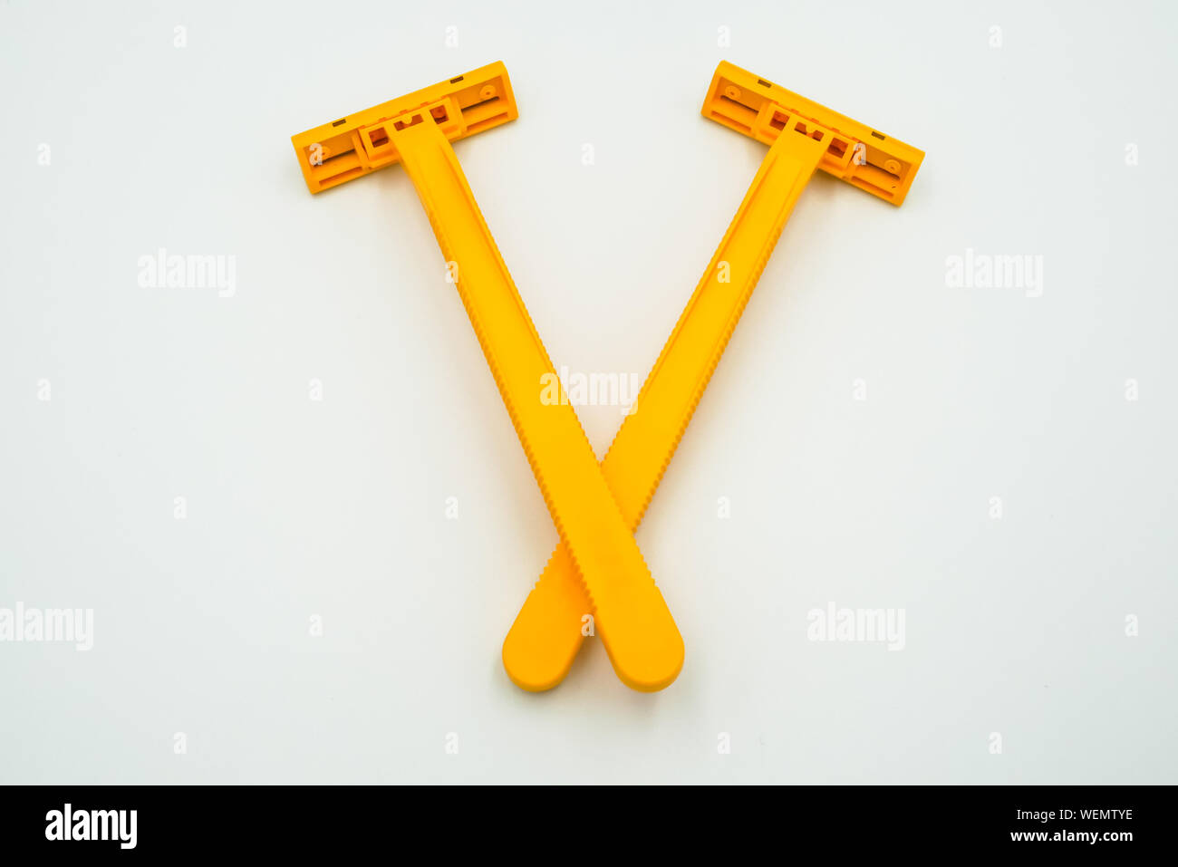 Shaving razor blades for men or women in yellow color, the object is ...