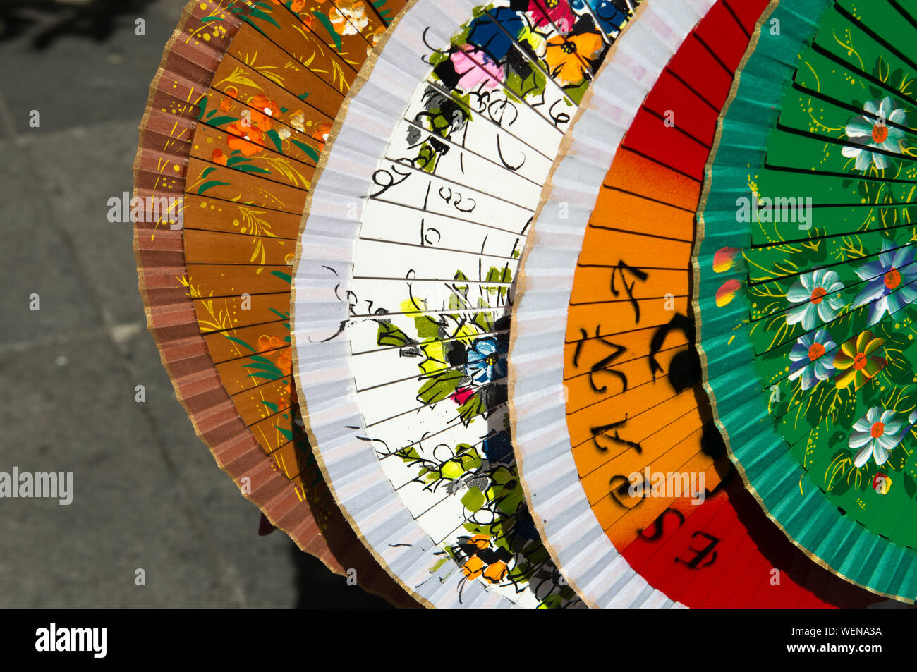 Paper fans open on display at spanish market Stock Photo - Alamy