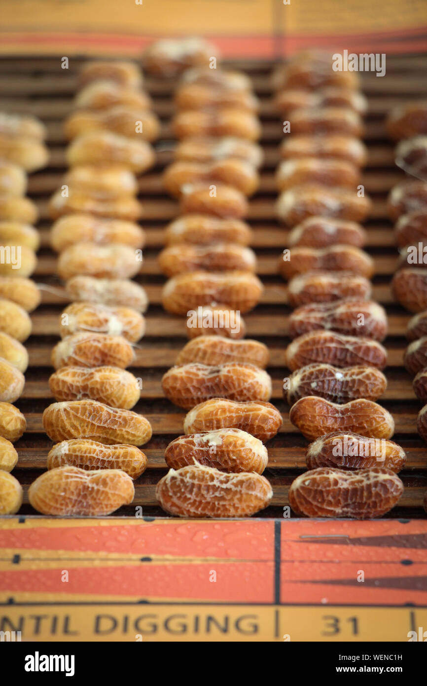 Row peanuts hi-res stock photography and images - Alamy