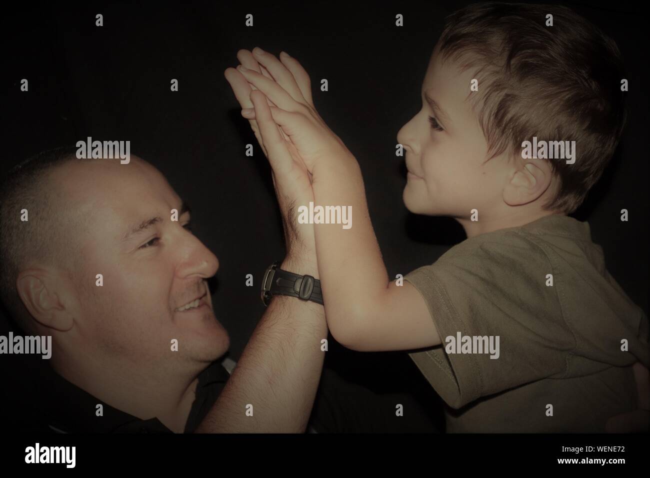 Boys high fiving hi-res stock photography and images - Alamy