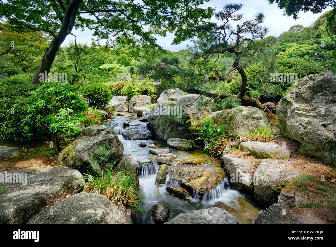 Beautiful small waterfall in japanese park. Fukuoka, Japan Stock Photo ...