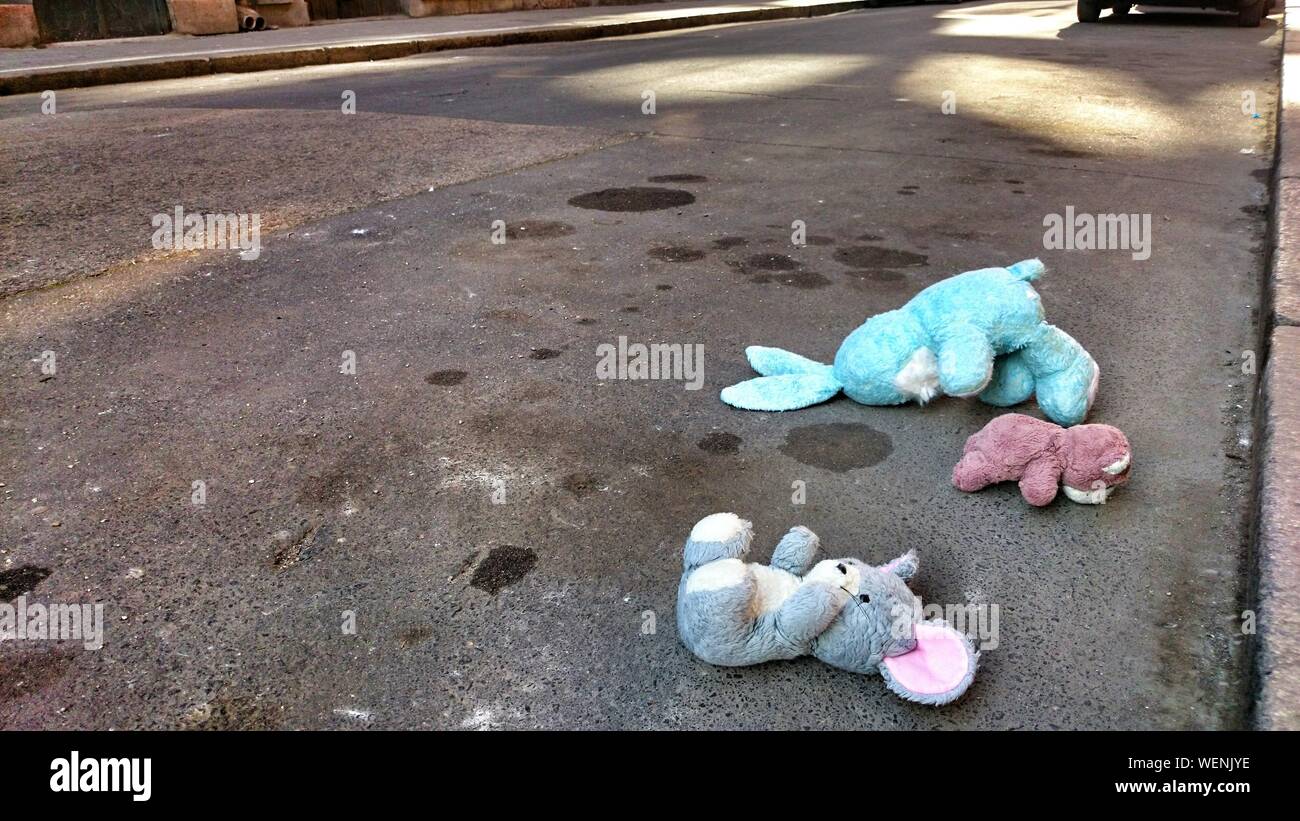 Stuffed Toys On Street Stock Photo - Alamy