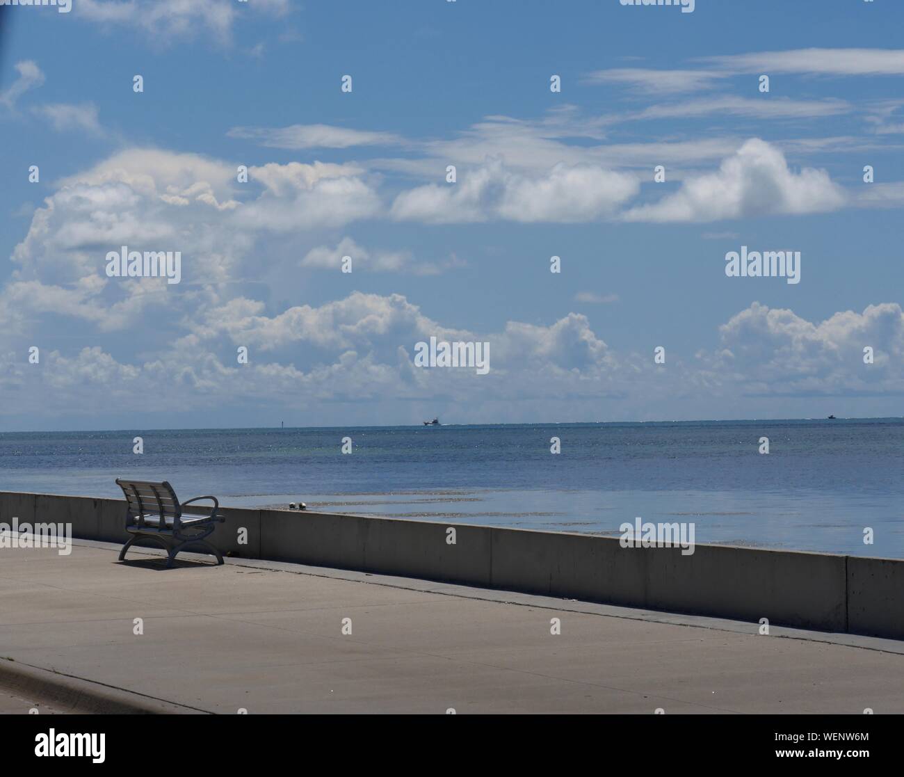 Wide shot with a bench facing the ocean along S Roosevelt Boulevard ...