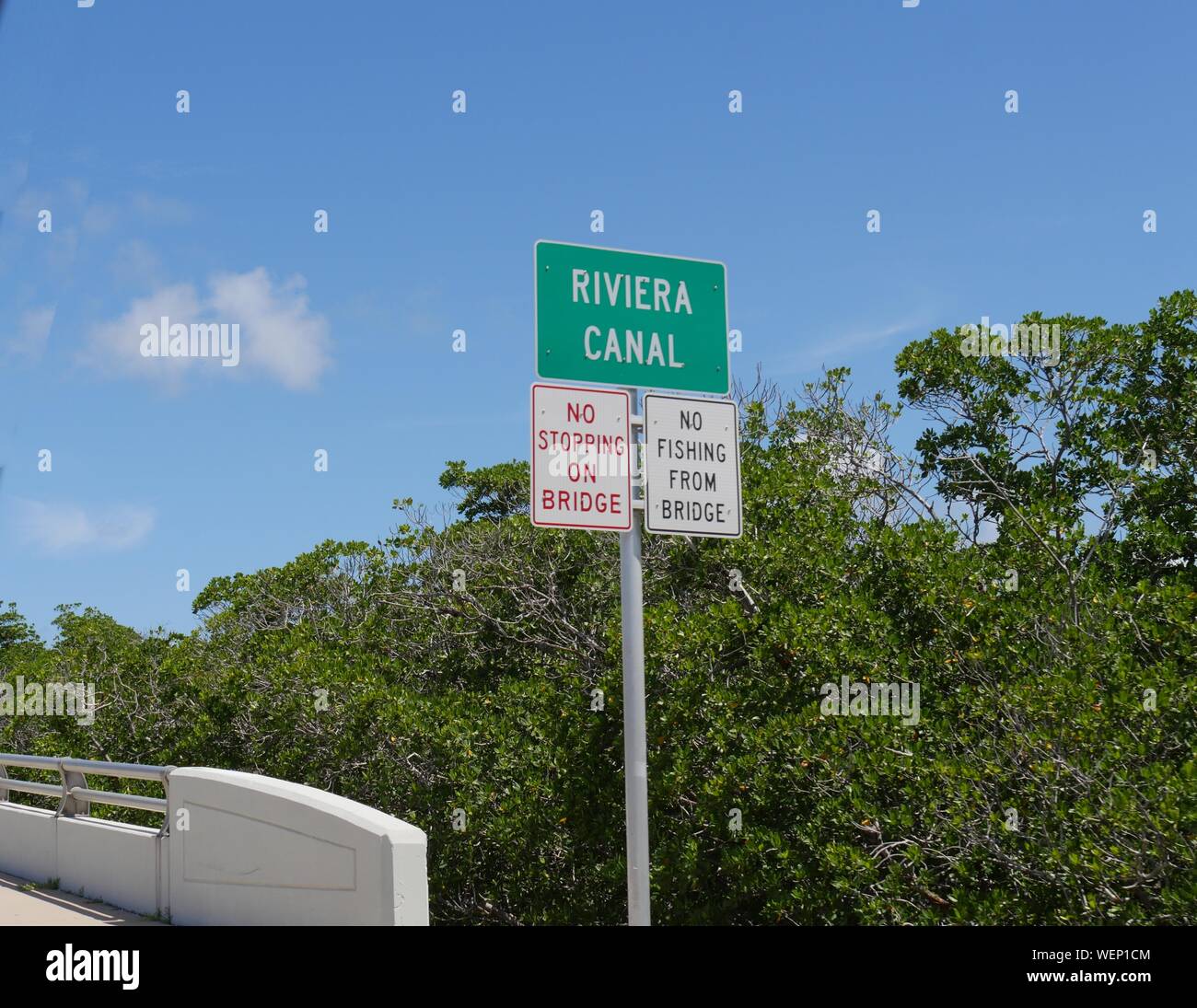 Roadside sign at the Riviera Canal at Key West, Florida Stock Photo - Alamy