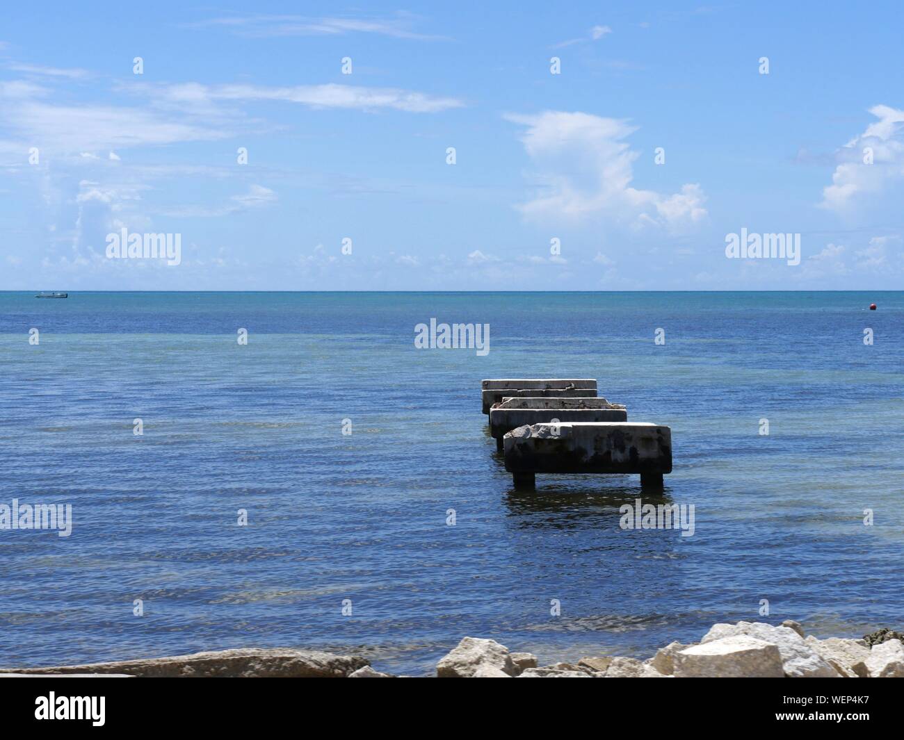 Row of concrete blocks in a seaside Stock Photo - Alamy