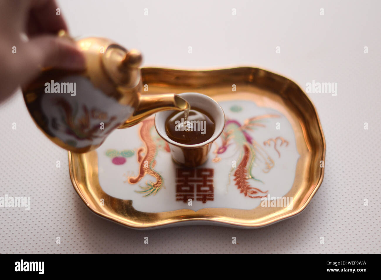 Gold tea tray hi-res stock photography and images - Alamy