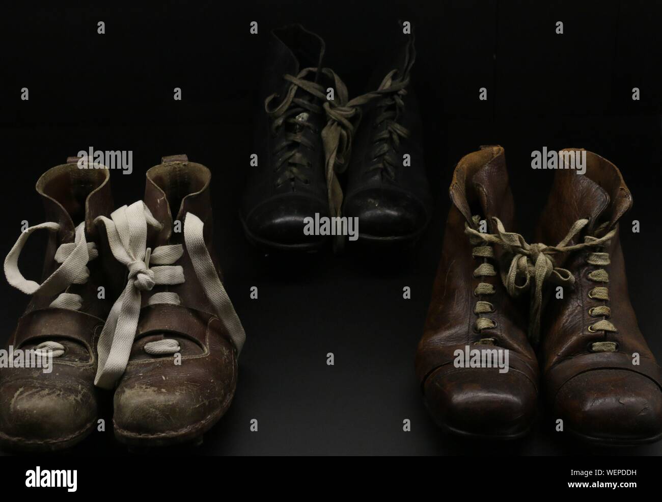 Shoes tied together hi-res stock photography and images - Alamy