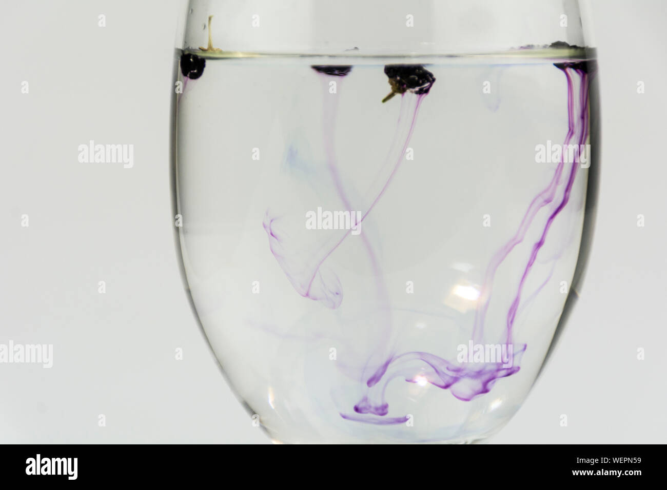Ink water glass dissolving hi-res stock photography and images - Alamy