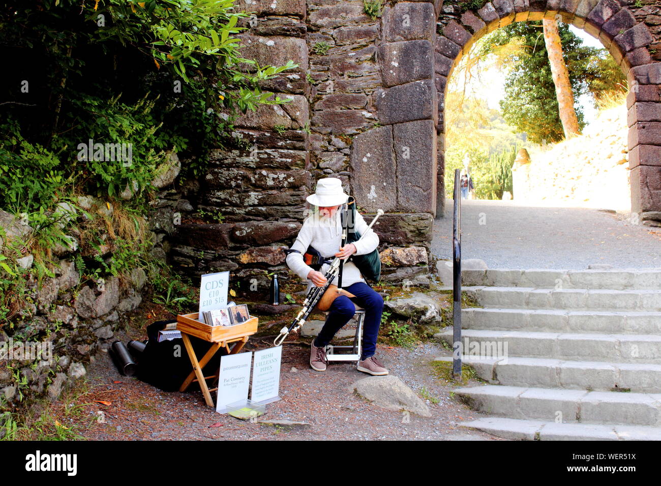 Street musician playing uilleann pipe hi-res stock photography and ...