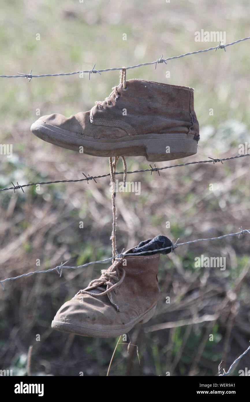 Shoes hanging wire hi-res stock photography and images - Alamy