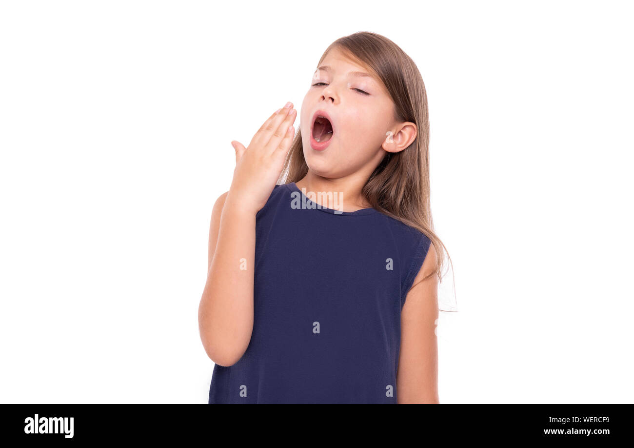 Little girl is yawning. Isolated on a white background Stock Photo - Alamy
