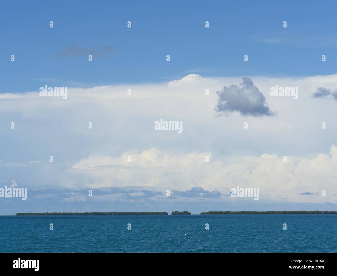Wide shot of some of the Florida Keys, with gorgeous clouds in the ...