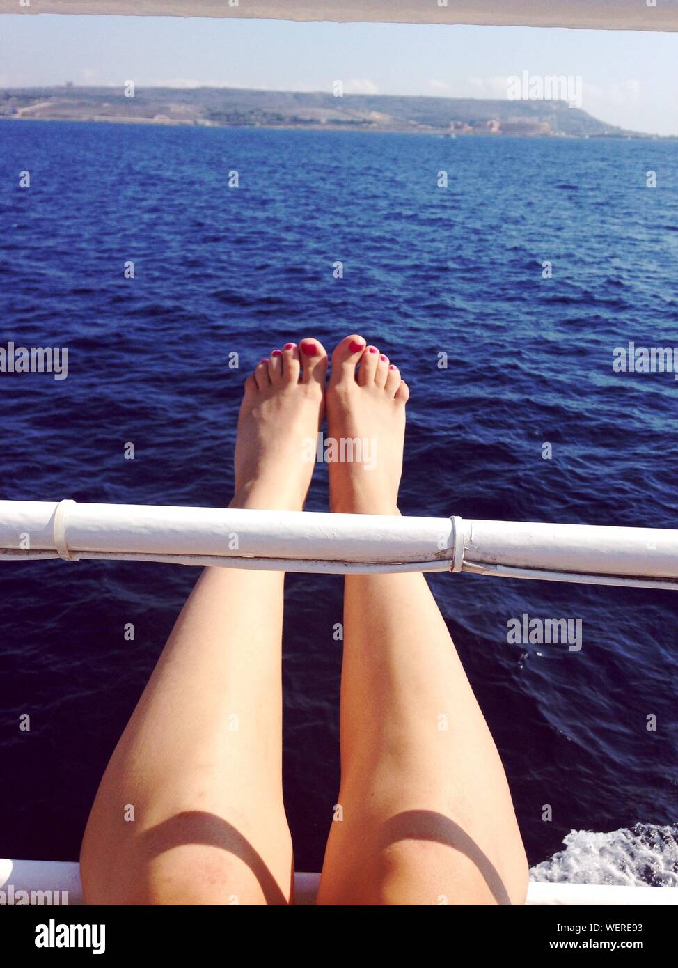 Women legs dangling hi-res stock photography and images - Alamy