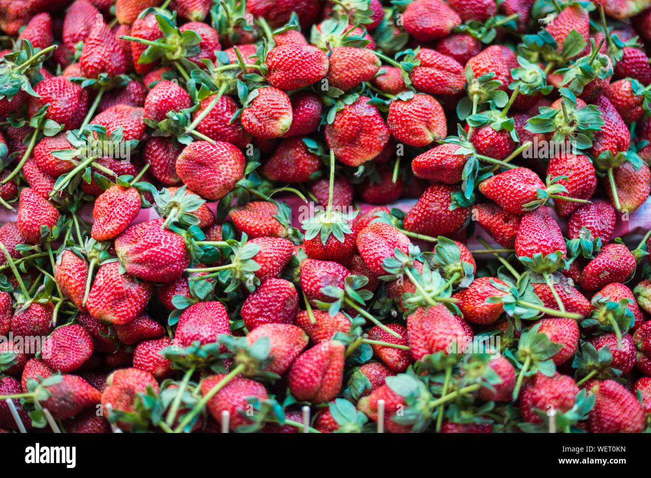 Full frame small strawberries hi-res stock photography and images - Alamy