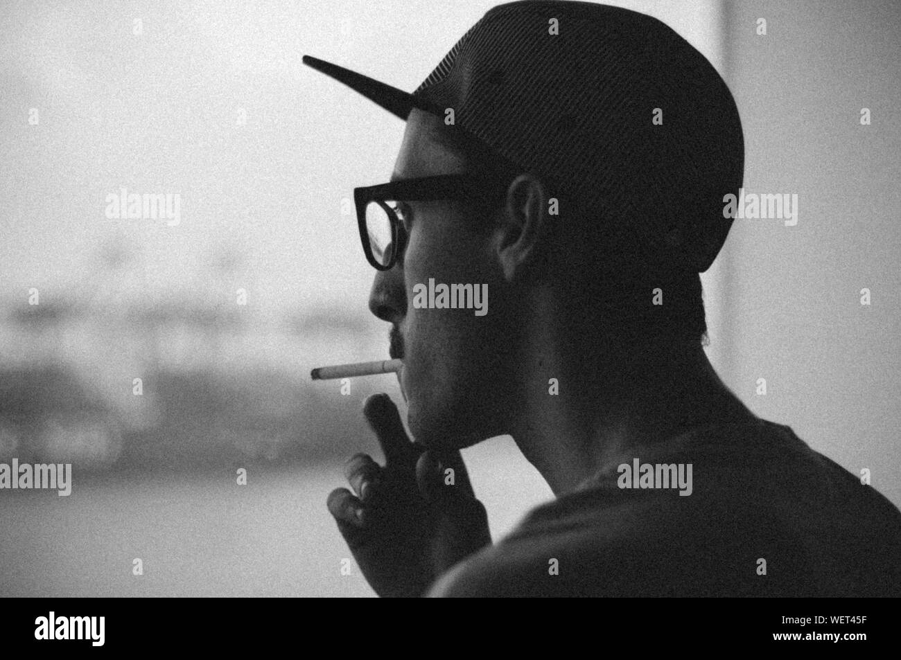 Man inhaling cigarette hi-res stock photography and images - Alamy