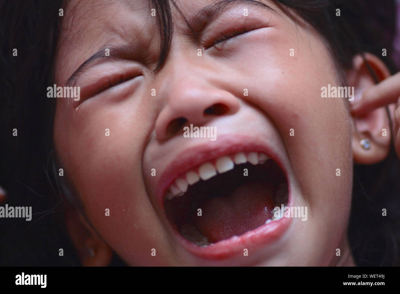 Close Up Crying Girl Face High Resolution Stock Photography and Images ...