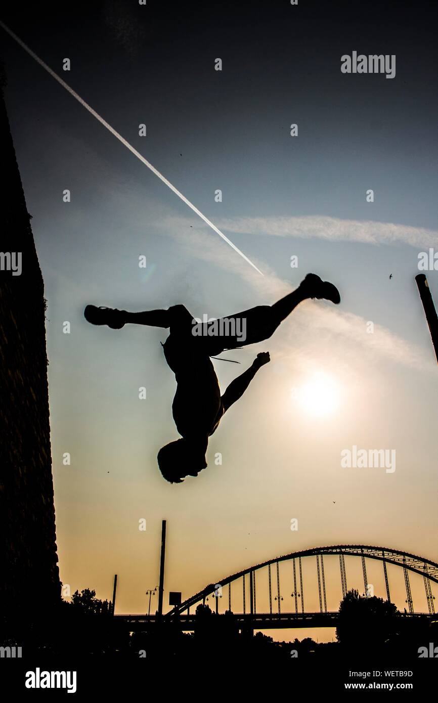 Man Jumping Mid Air Bridge High Resolution Stock Photography and Images ...