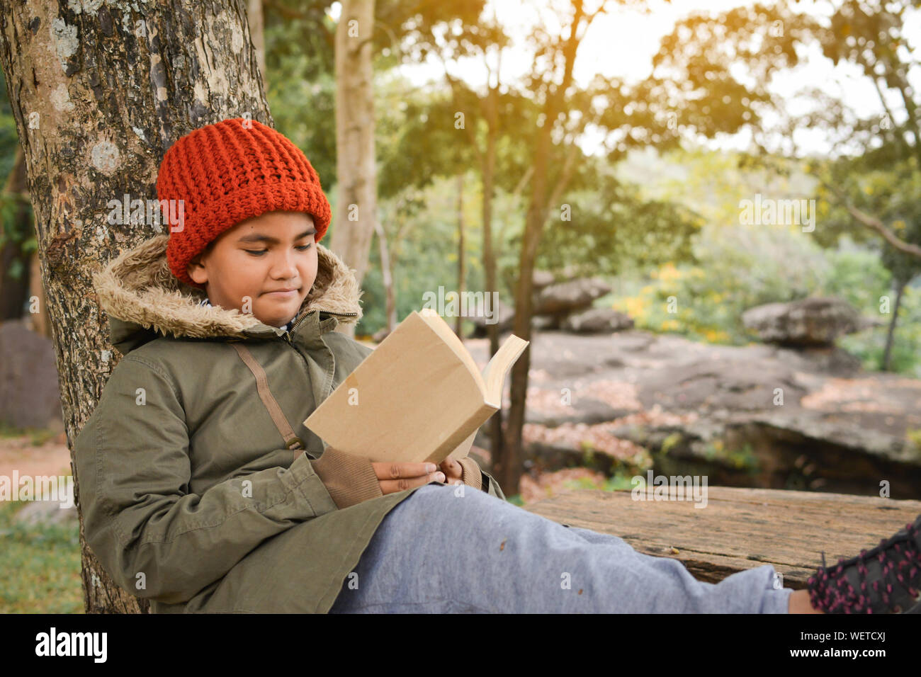 One boy reading hi-res stock photography and images - Alamy