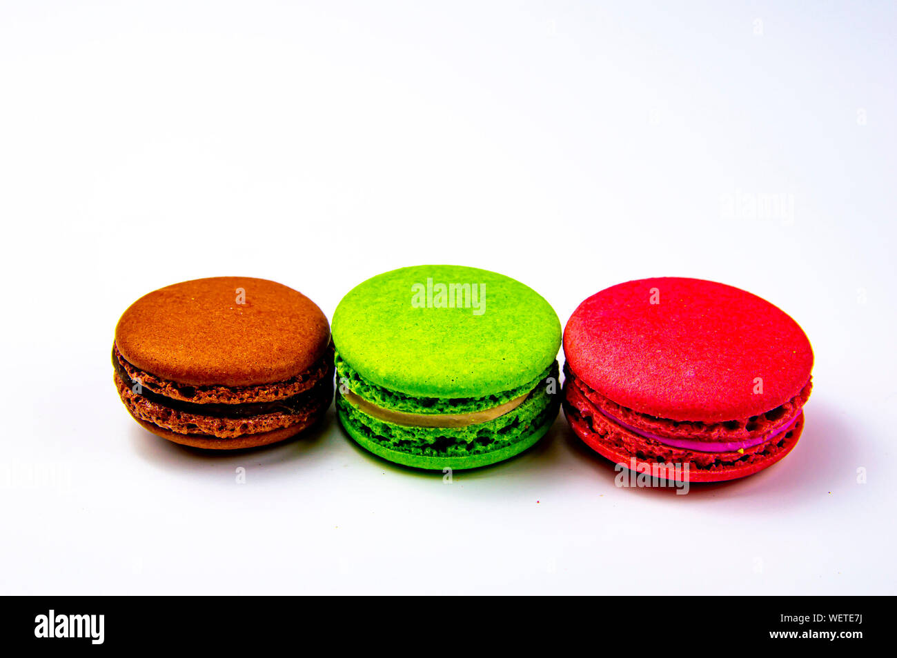 Round color cookies on a white background. Dessert. Sweets Stock Photo ...