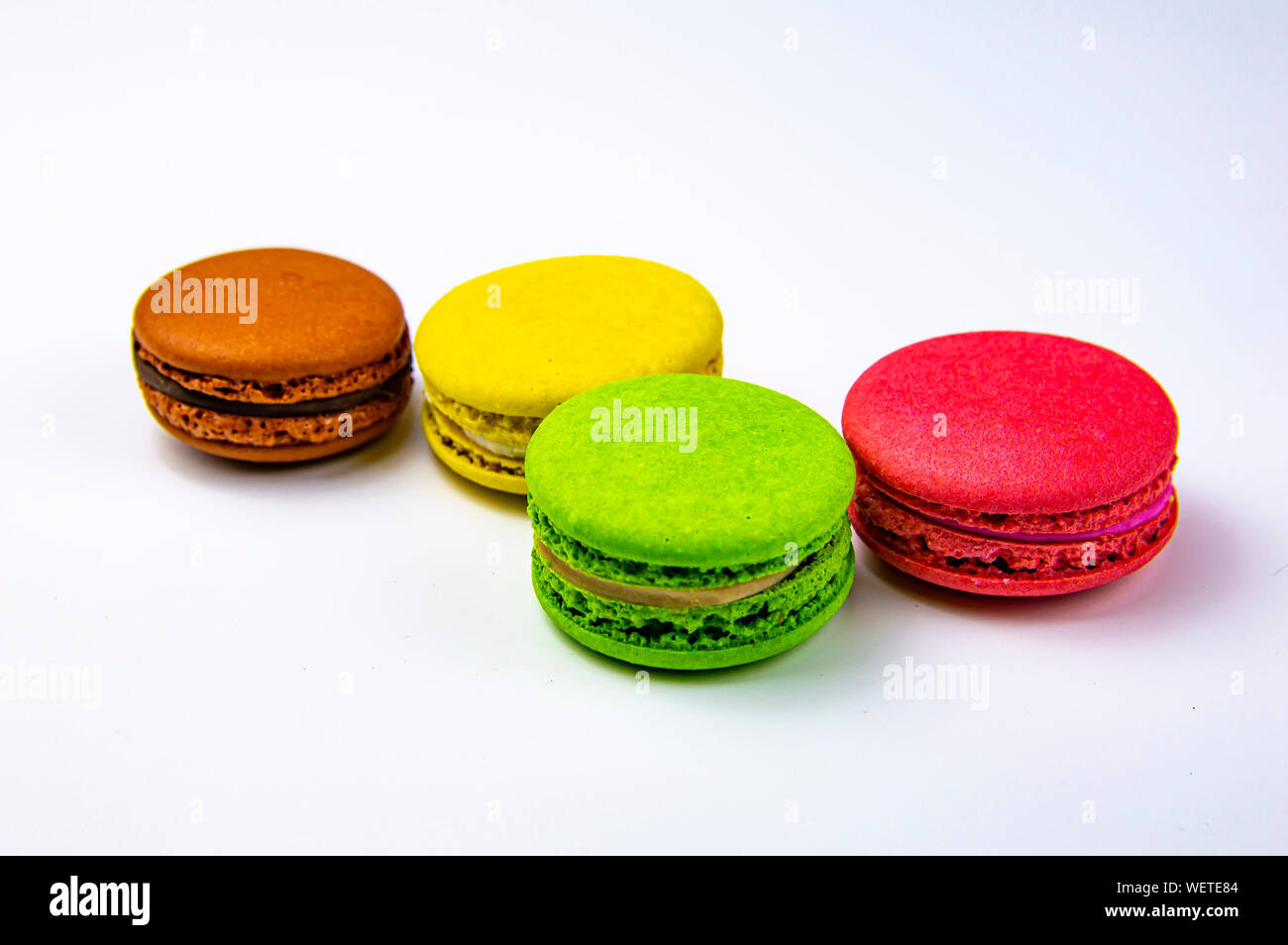 Round color cookies on a white background. Dessert. Sweets Stock Photo ...