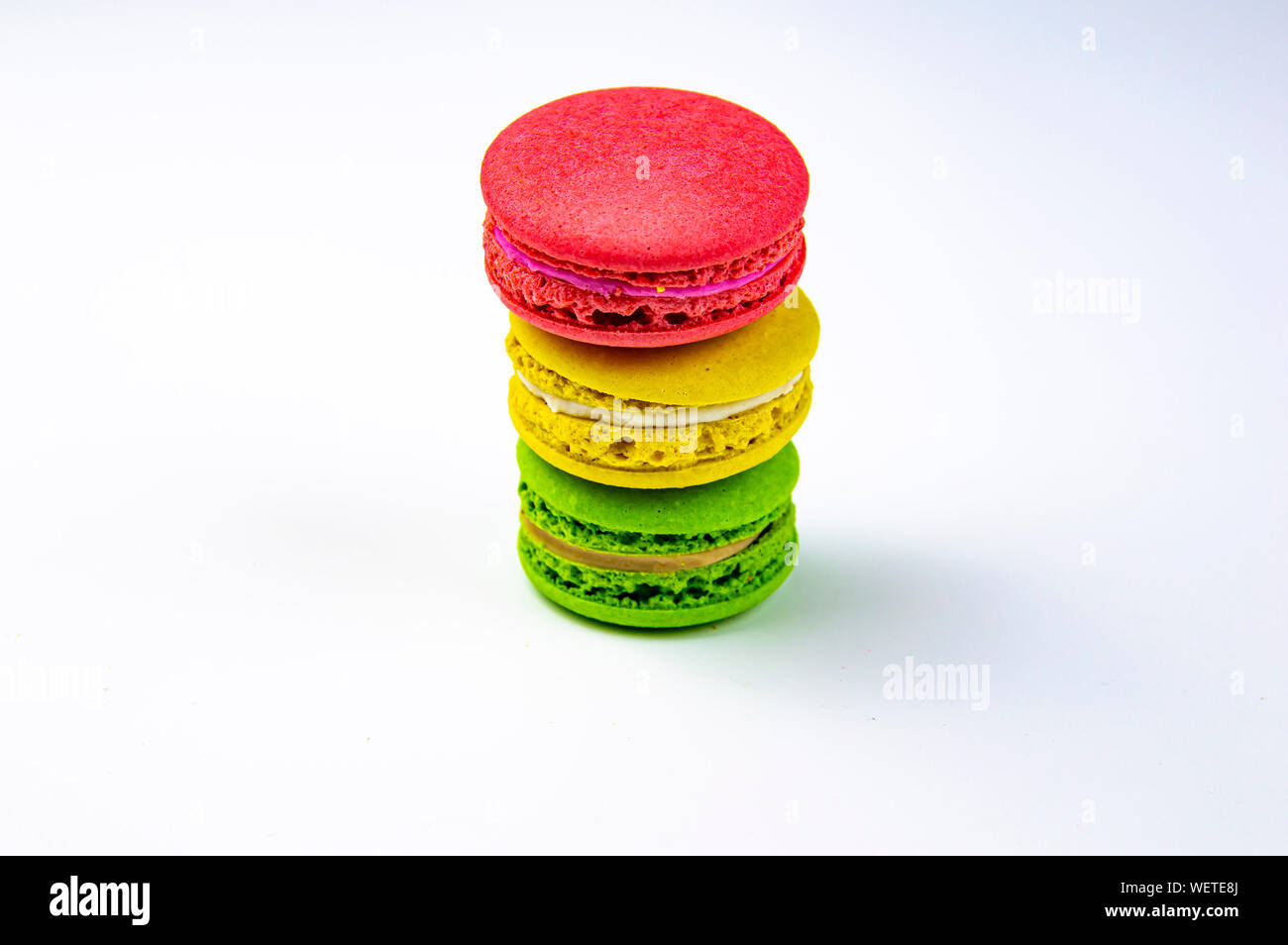 Round color cookies on a white background. Dessert. Sweets Stock Photo ...