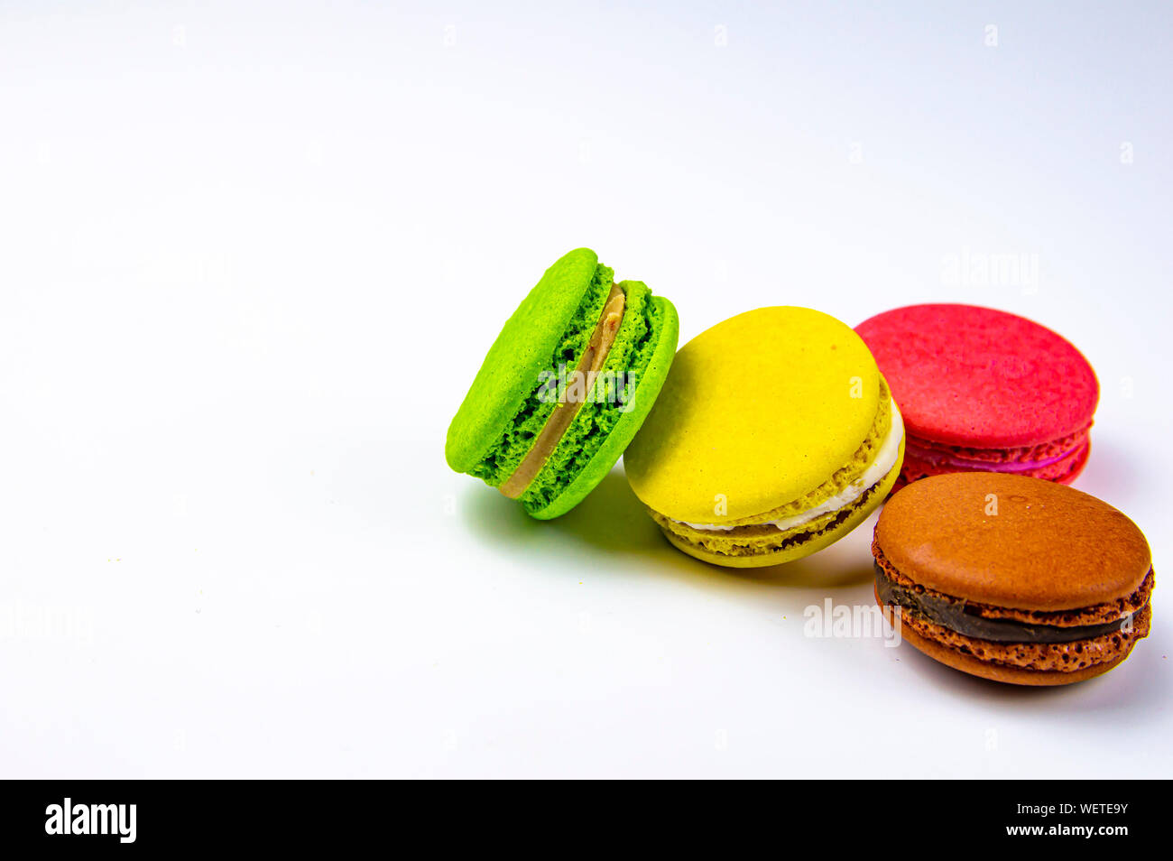 Round color cookies on a white background. Dessert. Sweets Stock Photo ...