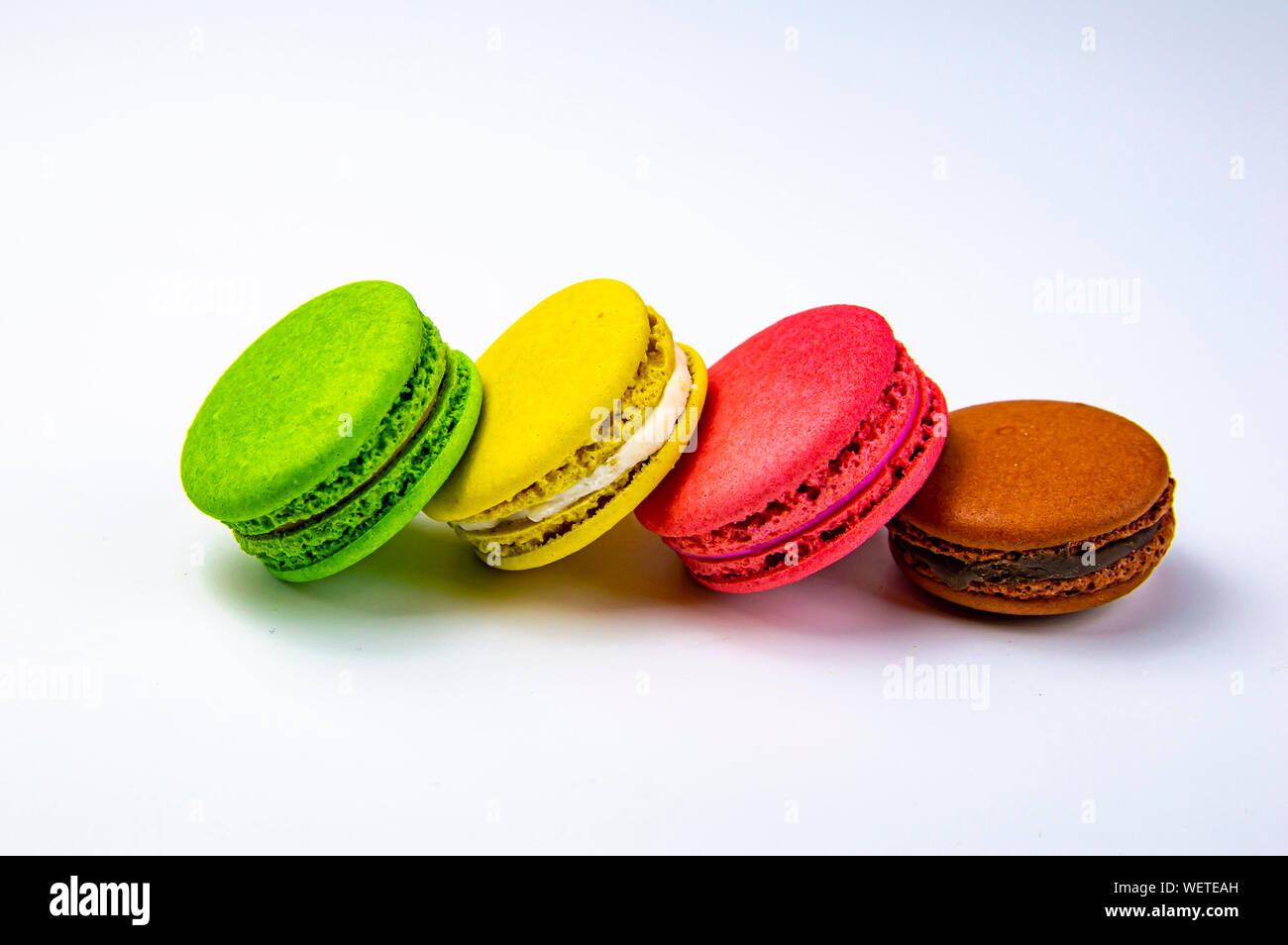 Round color cookies on a white background. Dessert. Sweets Stock Photo ...