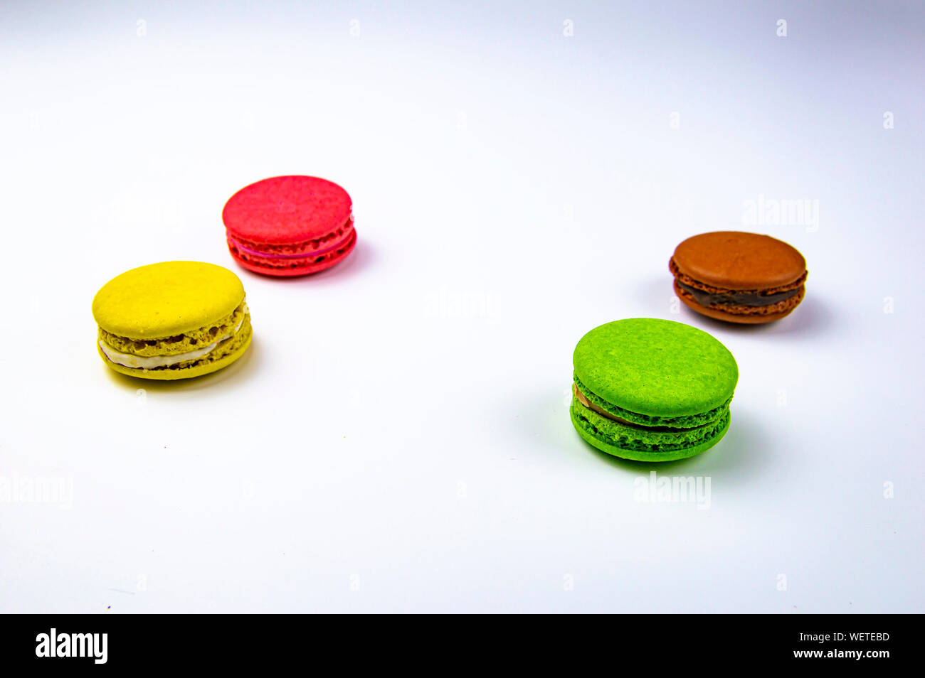 Round color cookies on a white background. Dessert. Sweets Stock Photo ...
