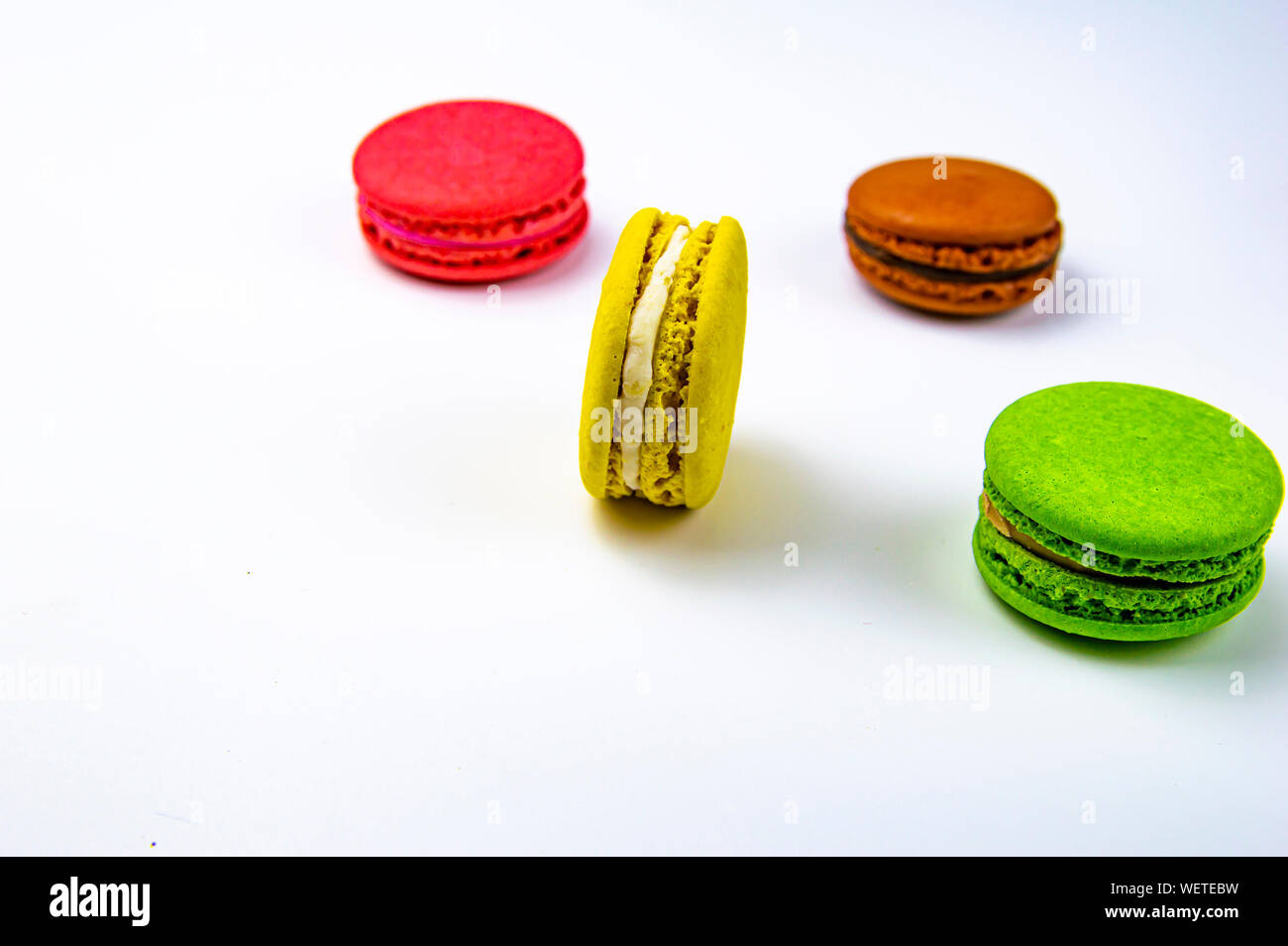 Round color cookies on a white background. Dessert. Sweets Stock Photo ...