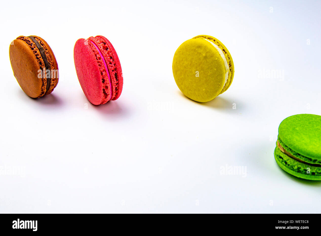 Round color cookies on a white background. Dessert. Sweets Stock Photo ...