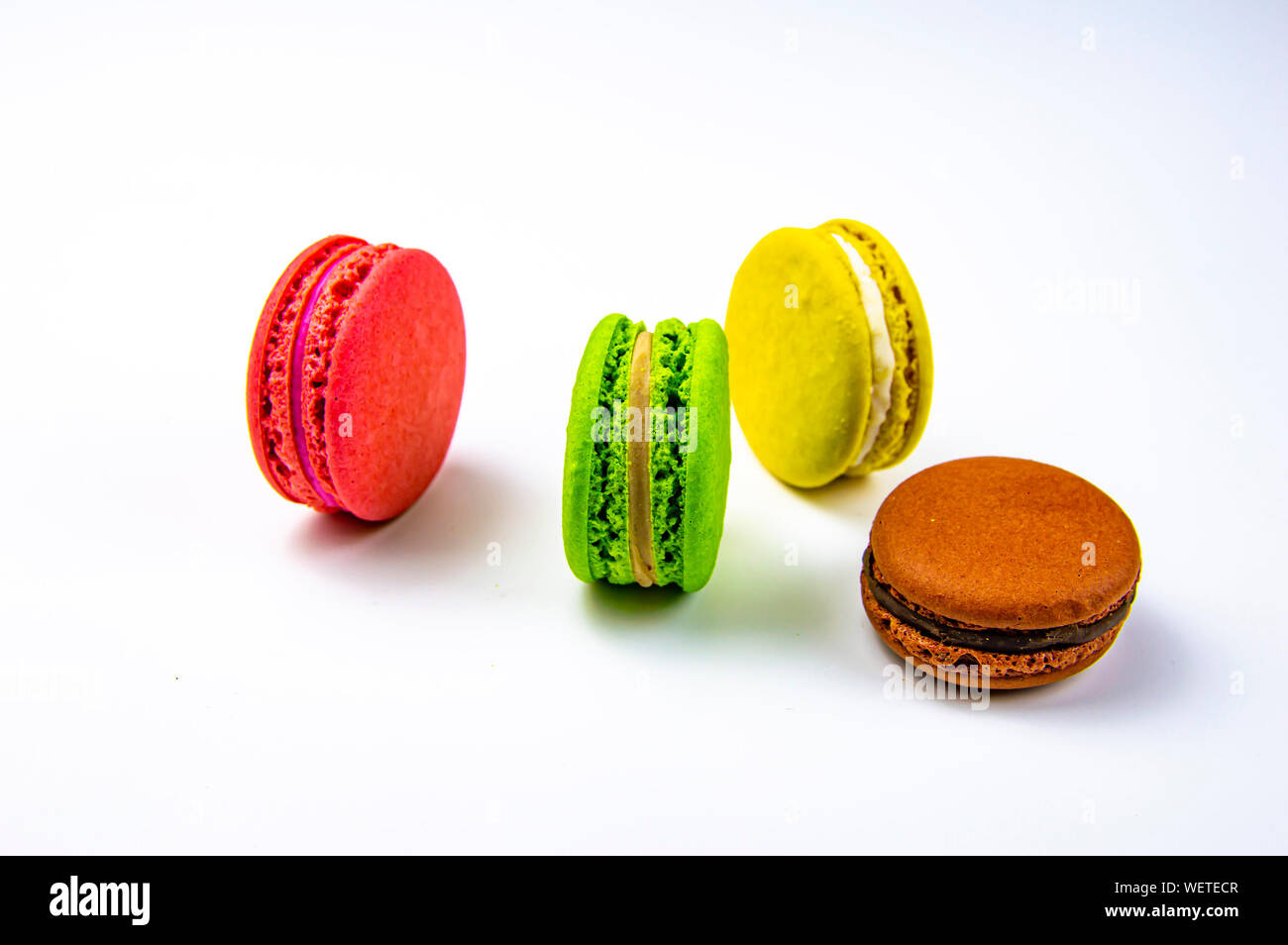 Round color cookies on a white background. Dessert. Sweets Stock Photo ...