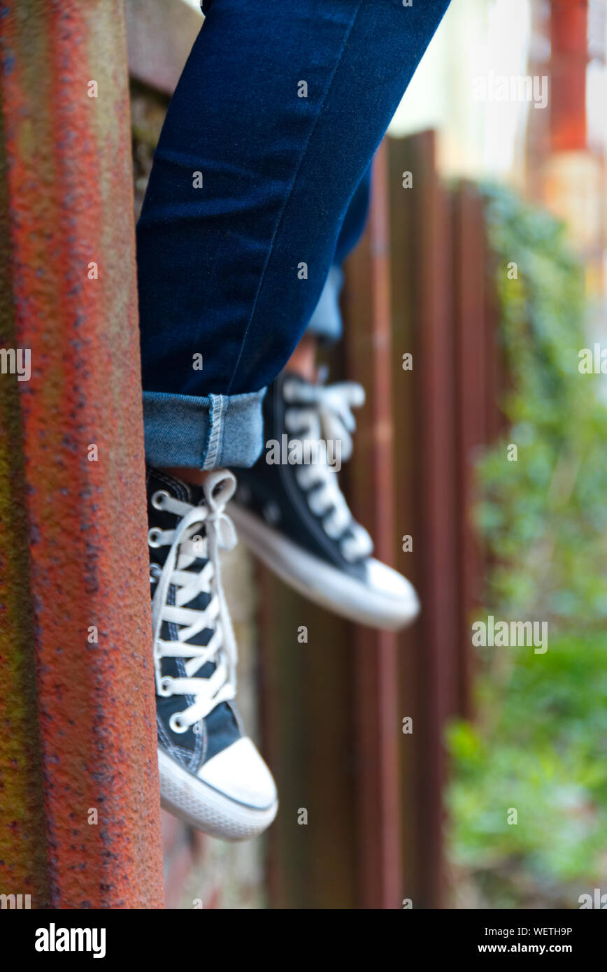 Leg on fence hi-res stock photography and images - Alamy