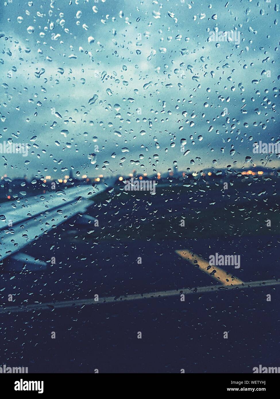 Wet rainy airport hi-res stock photography and images - Alamy