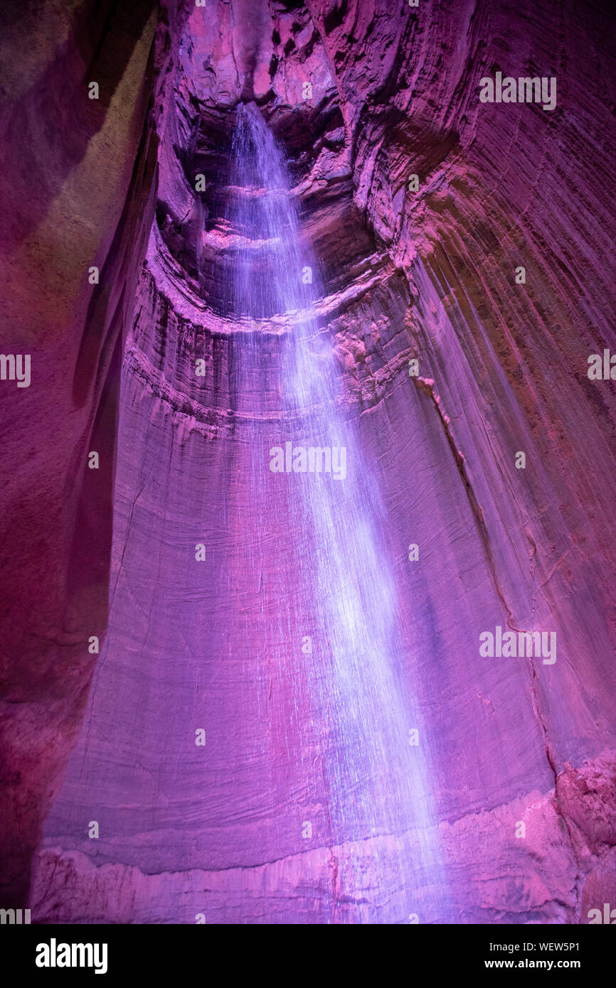 Source of water creating waterfall inside massive natural cavern Stock ...