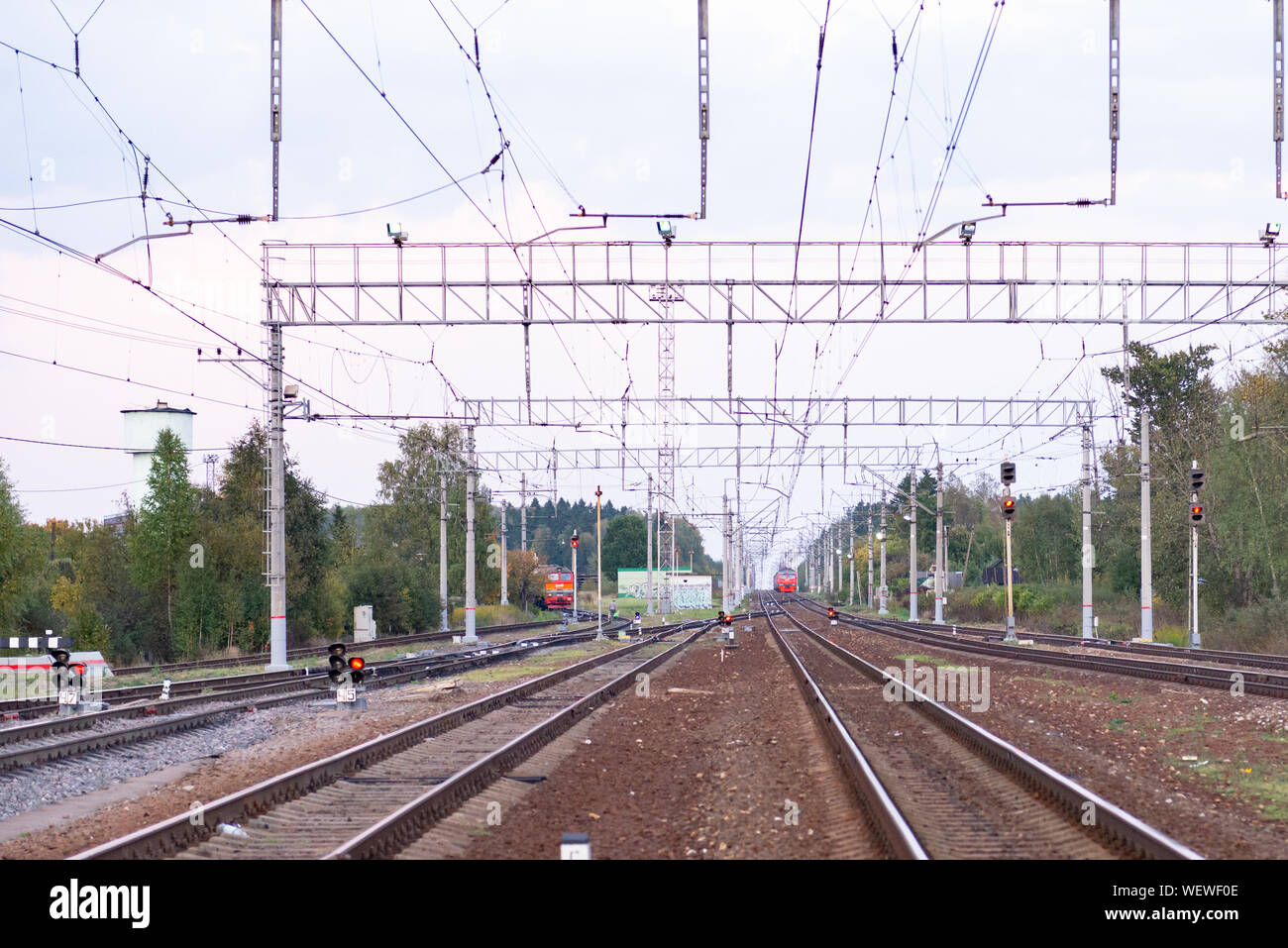 Rails. Railway tracks and trains. Red railroad signal lights Stock ...