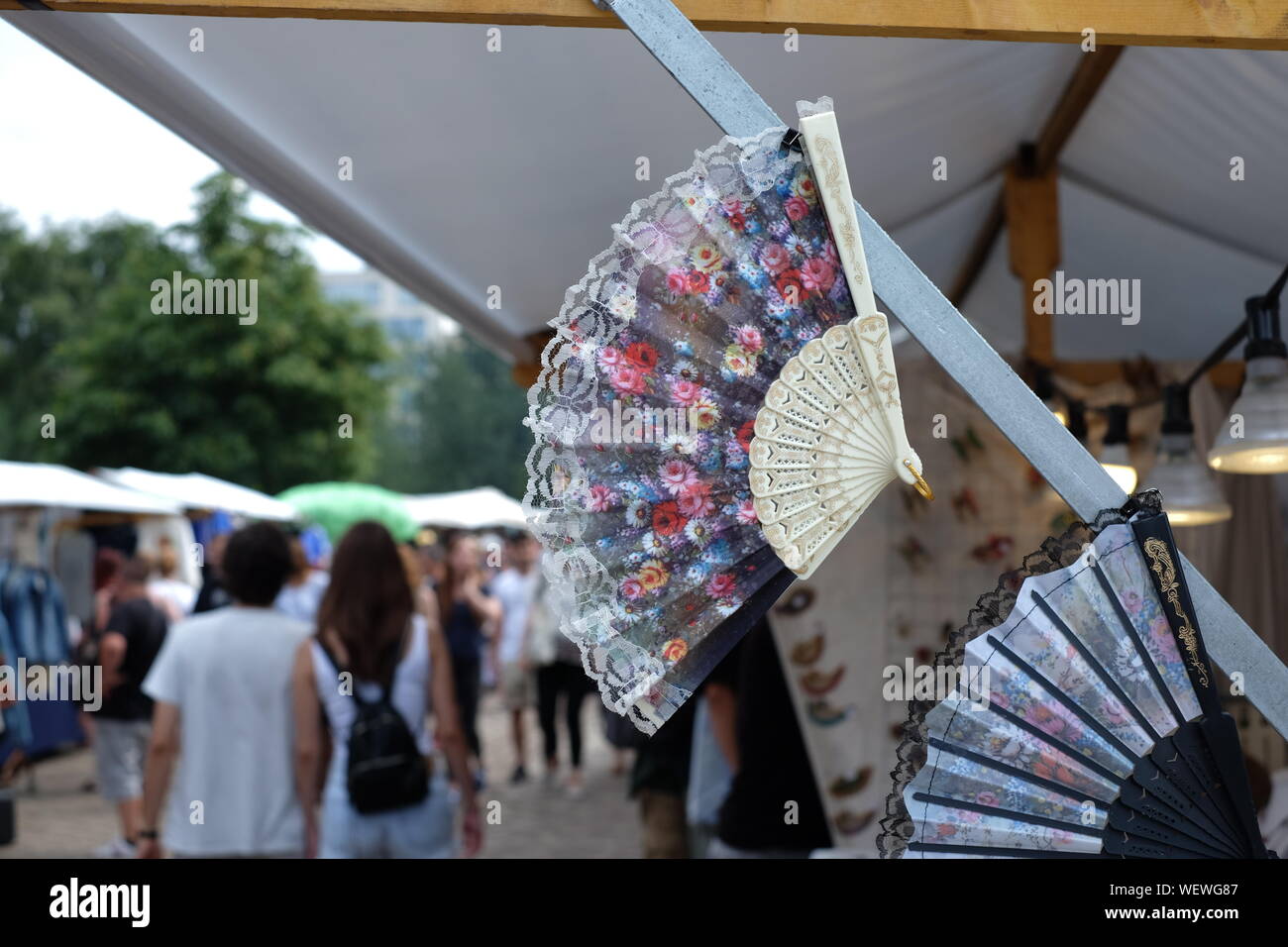 Hand fan stall hi-res stock photography and images - Alamy