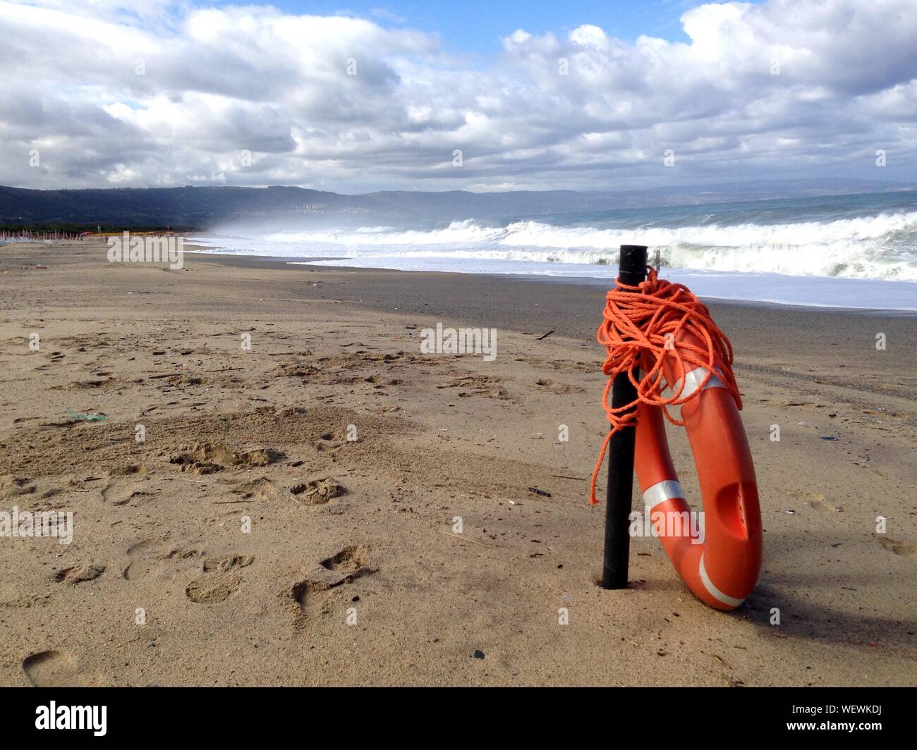 Life ring on beach hi-res stock photography and images - Alamy