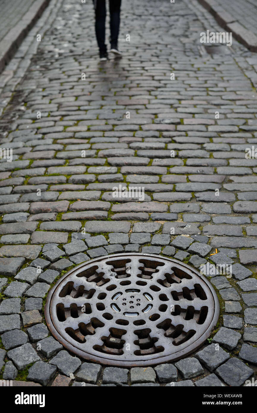 Manhole street low angle hi-res stock photography and images - Alamy