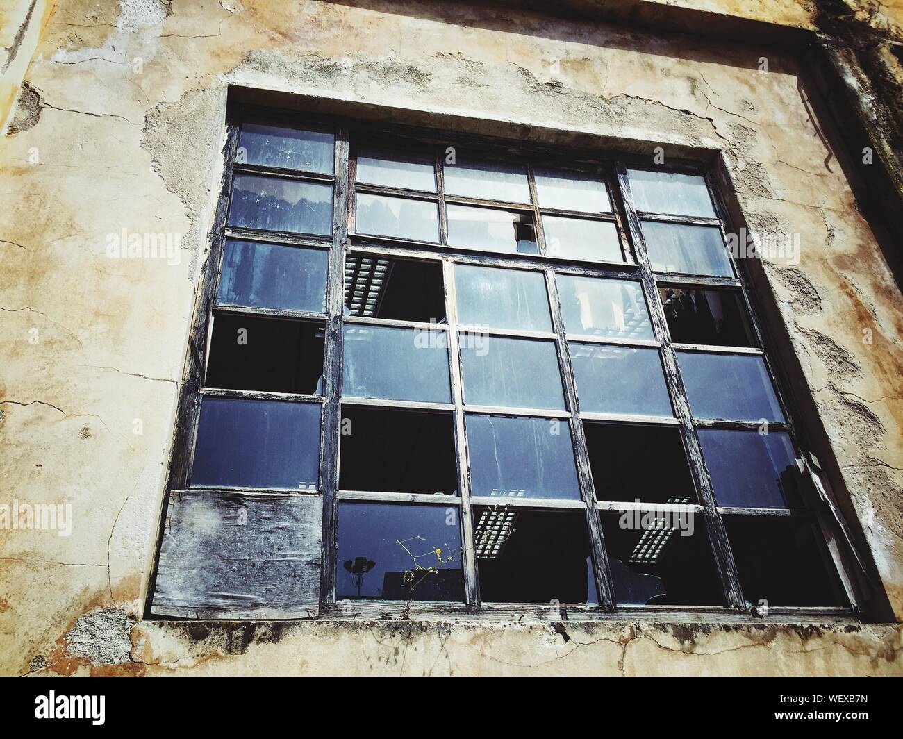 Broken Glass Window Of Old Building Stock Photo - Alamy