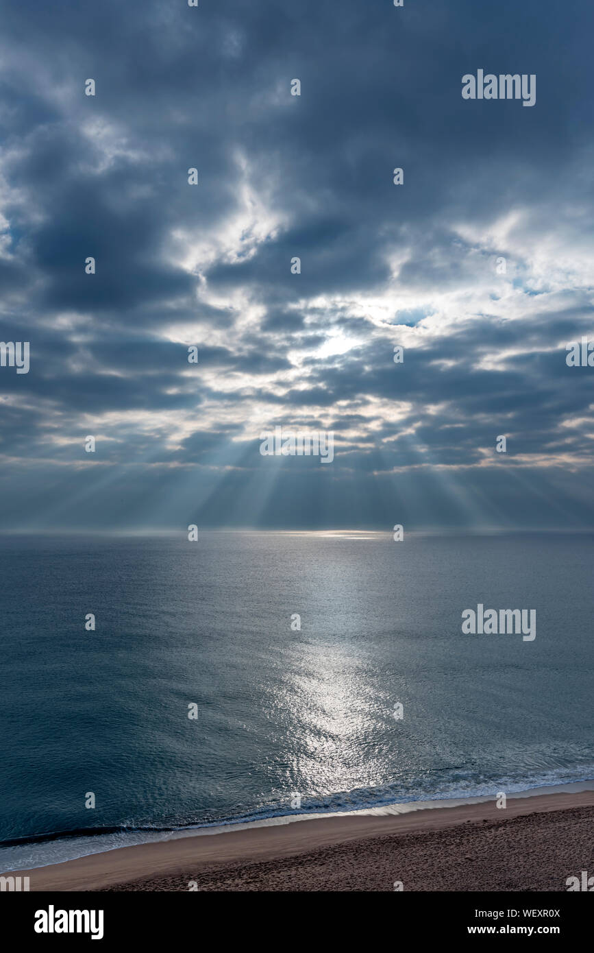 Sunrays over the sea hi-res stock photography and images - Alamy