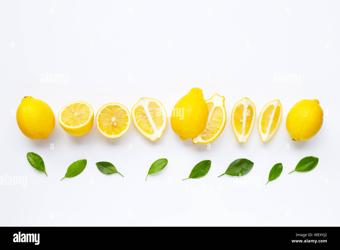 Fresh lemon with leaves isolated on white background Stock Photo - Alamy